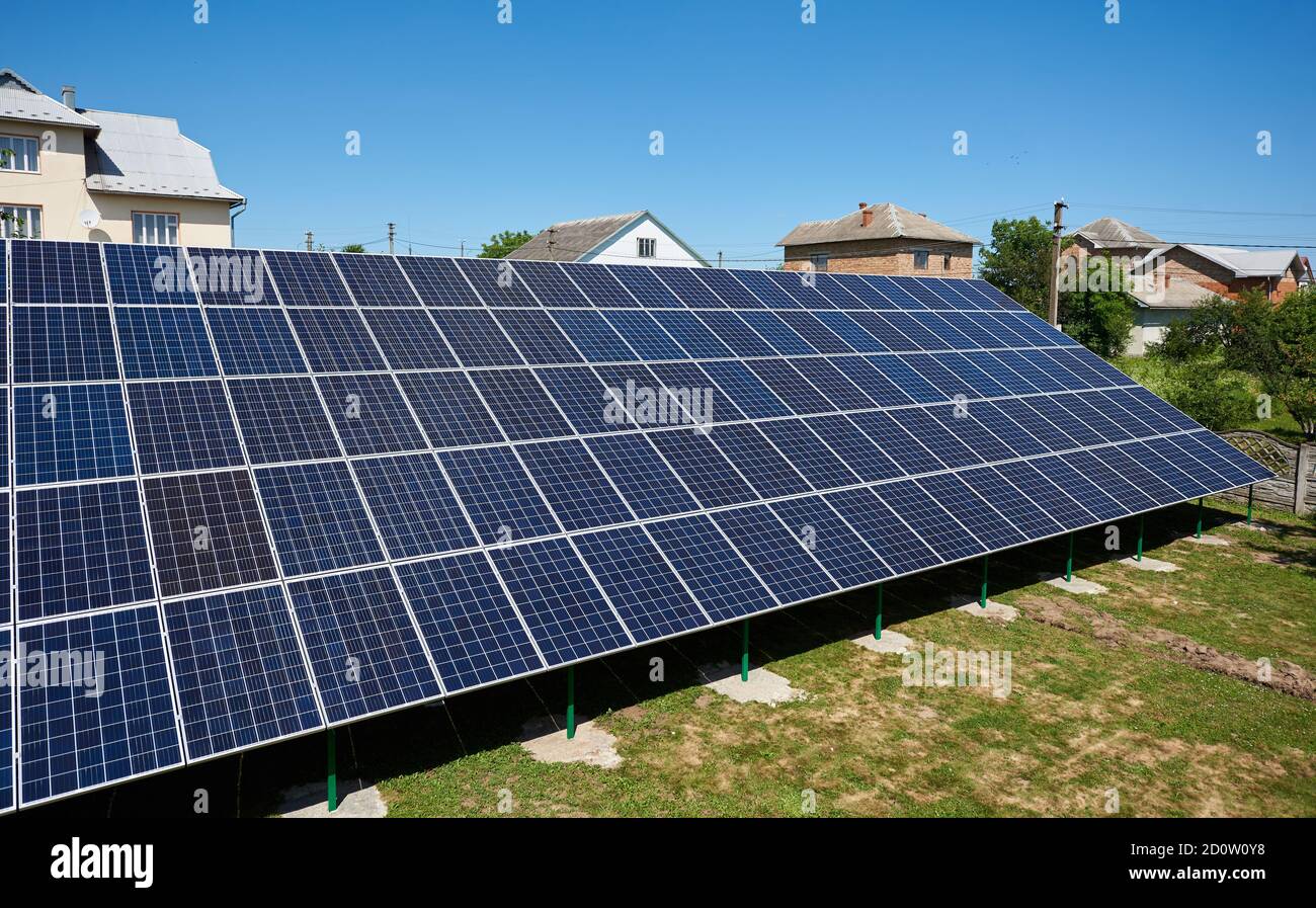 Sideview of huge solar panels installed on outdoors opened space ...