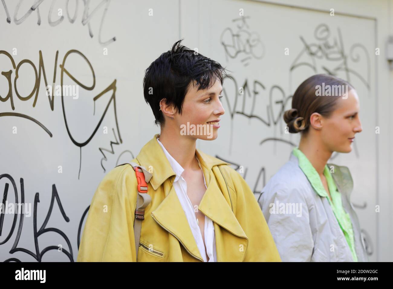 September 24, 2020: Model wears a yellow leather jacket Stock Photo - Alamy