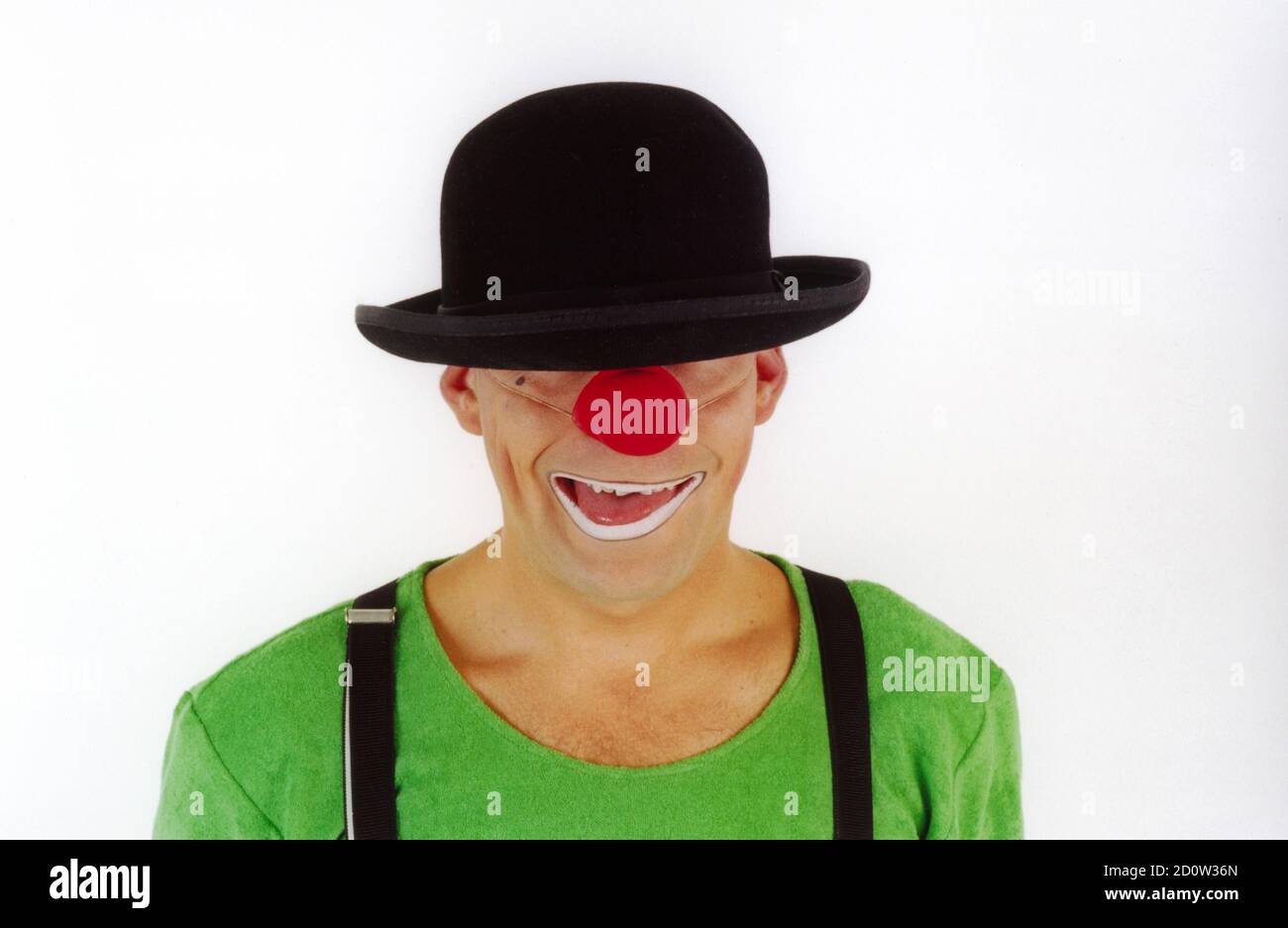 Clown, red nose, hat on face, laughing, Berlin, Germany, Europe Stock ...