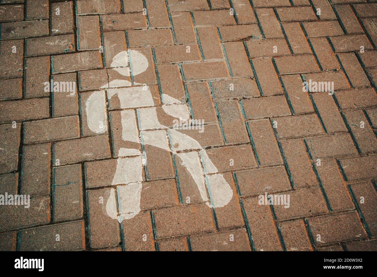 figure of a man on the asphalt footpath surface pedestrian Stock Photo ...