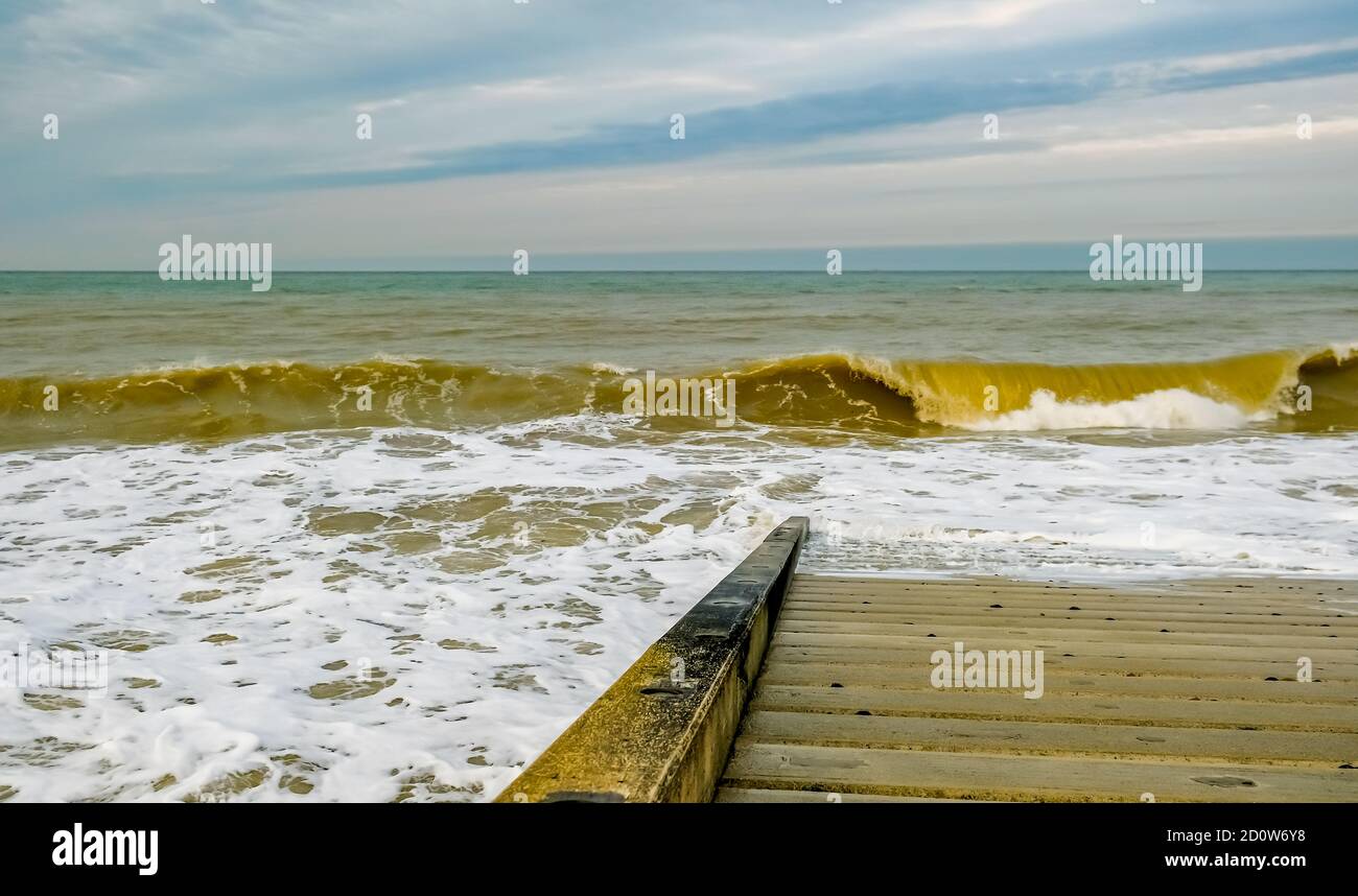 View down the wooden ramp on Cart Gap Beach Stock Photo - Alamy