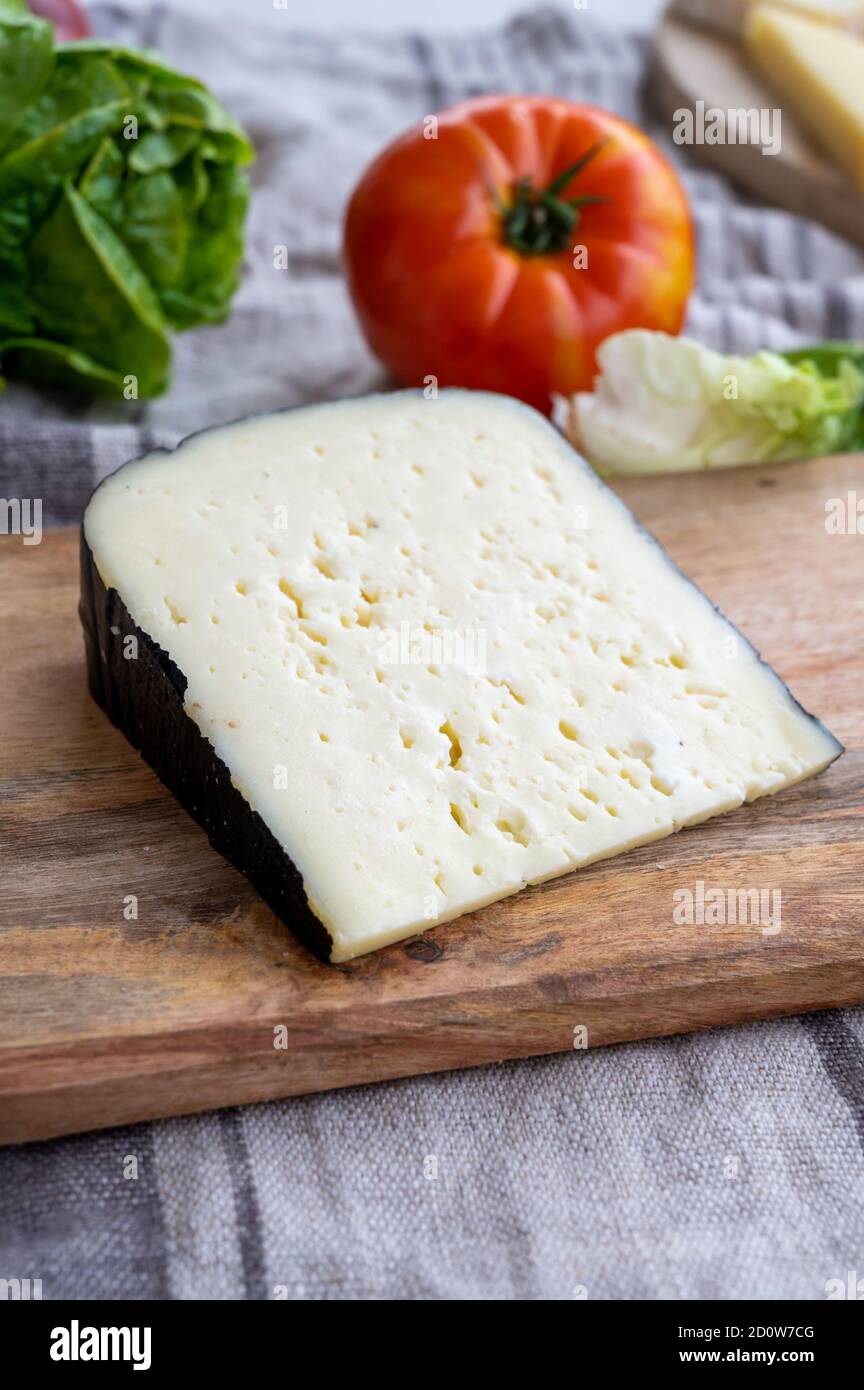 Cheese collection, French fol epi cheese with many little holes, etorki ...