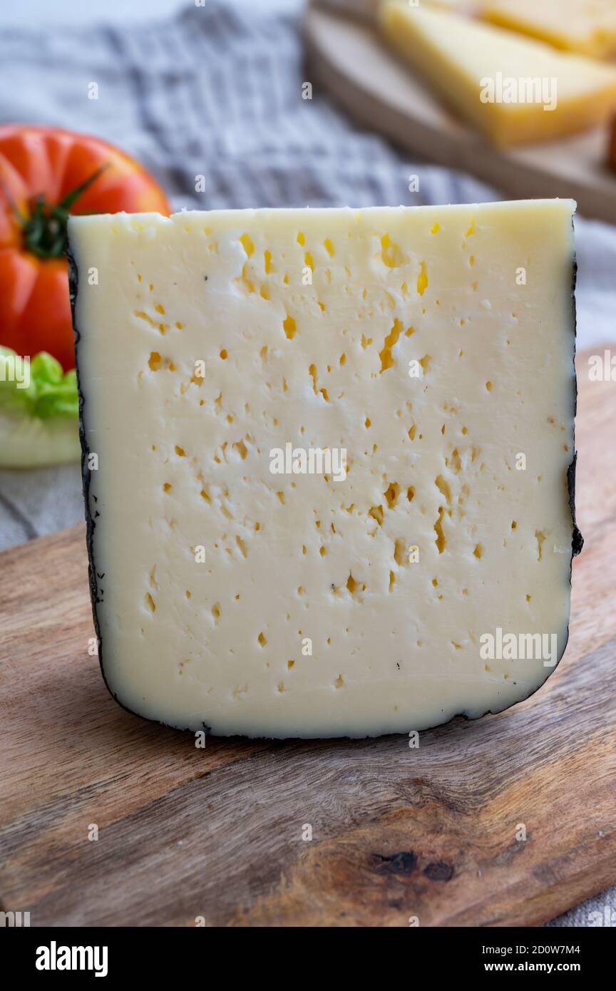 Cheese collection, French fol epi cheese with many little holes, etorki ...