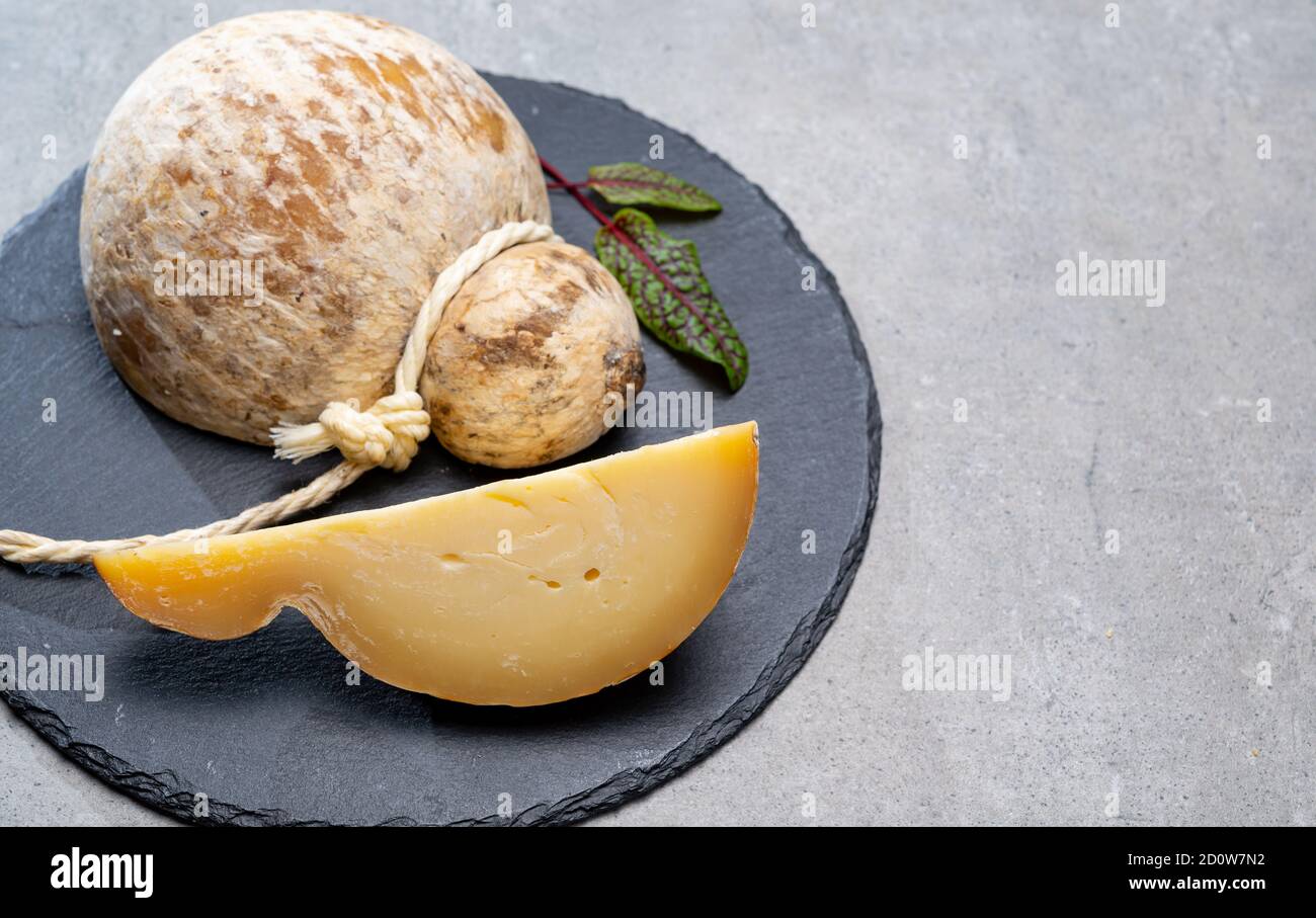 Italian semi hard matured caciocavallo cheese, handmade and aged in ...