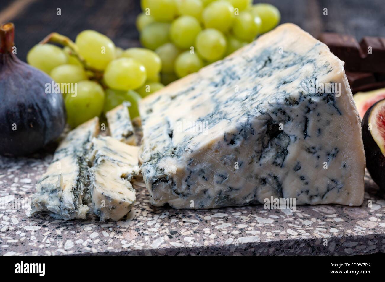 Cheese collection, piece of italian blue cheese gorgonzola picante with ...