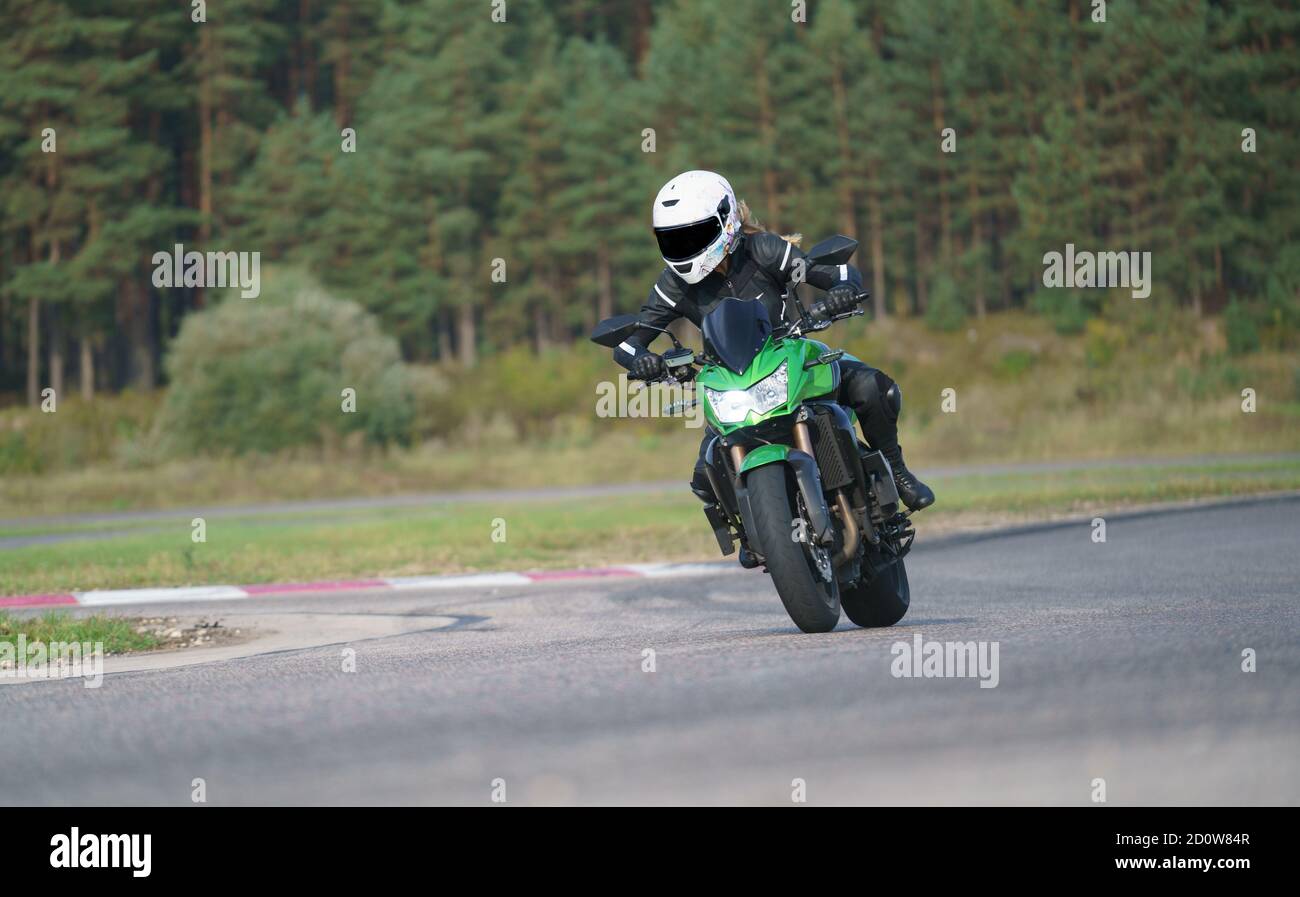 Fast Motorcycle road riding. having fun driving the empty highway on a ...