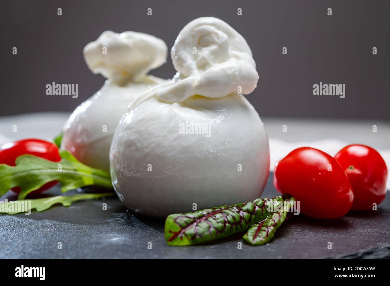 Cheese collection, fresh soft white burrata cheese ball made from ...