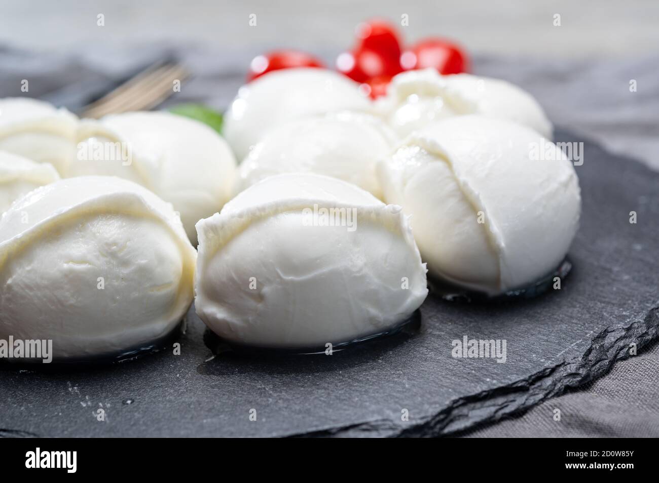 Tasty italian food, fresh white buffalo mozzarella soft cheese balls ...