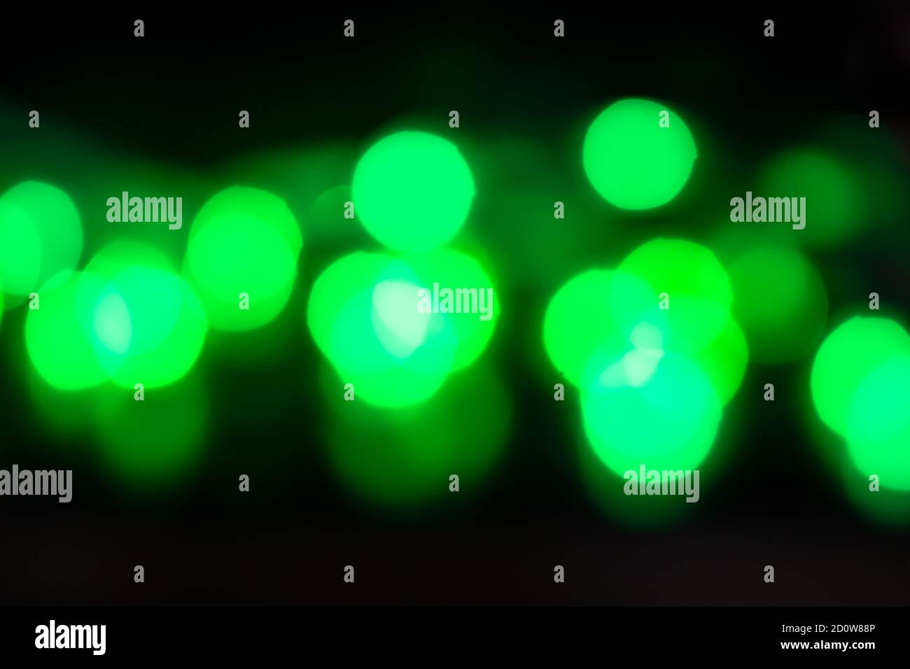 The colorful street lights that glow with blur at night look pretty ...