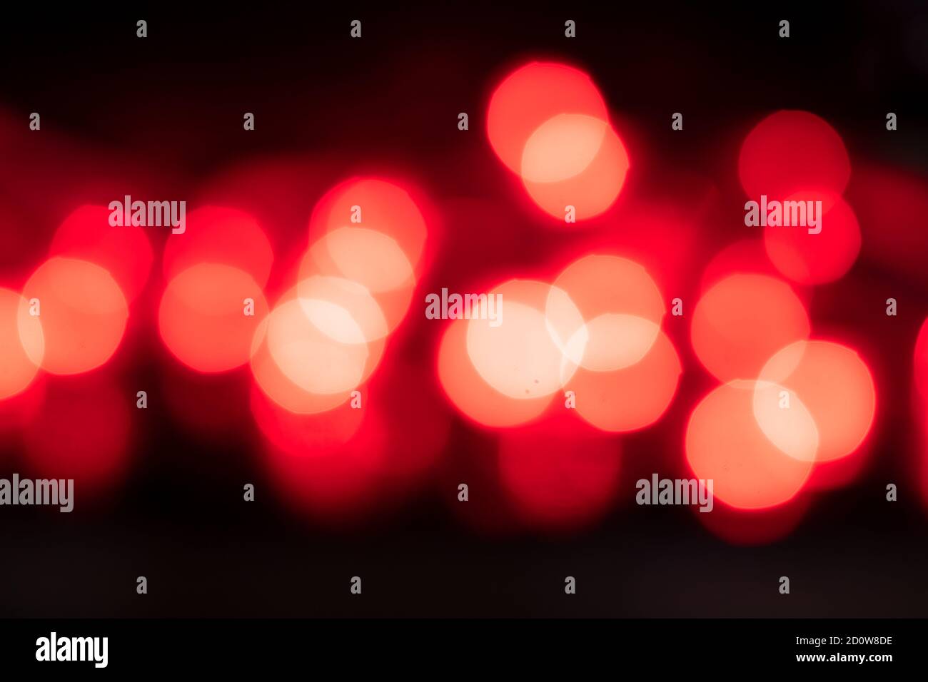 The colorful street lights that glow with blur at night look pretty ...