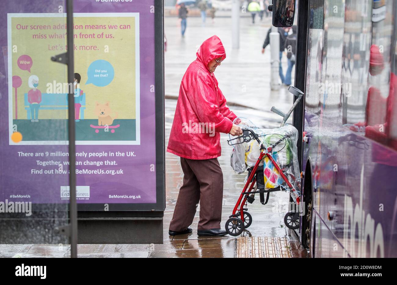 Woman bus in heavy rain in nottingham city centre hi-res stock ...