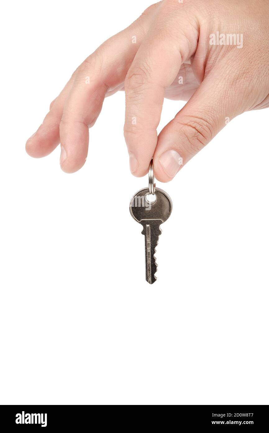 Keys from the lock in hand isolated on white background Stock Photo - Alamy