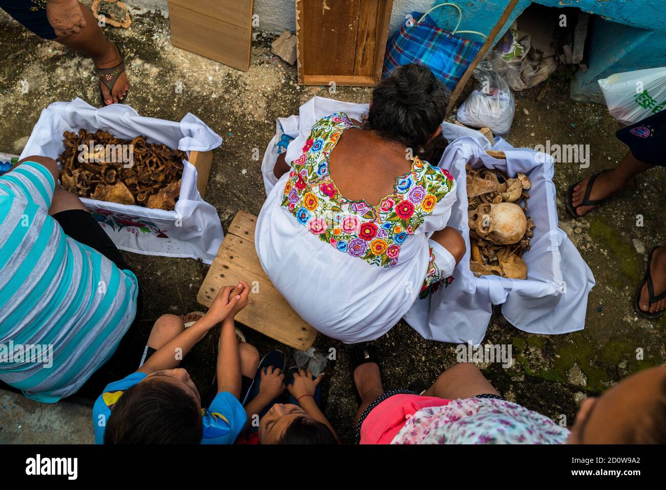 Mayan peasants take care of dried-up bones of deceased family members ...