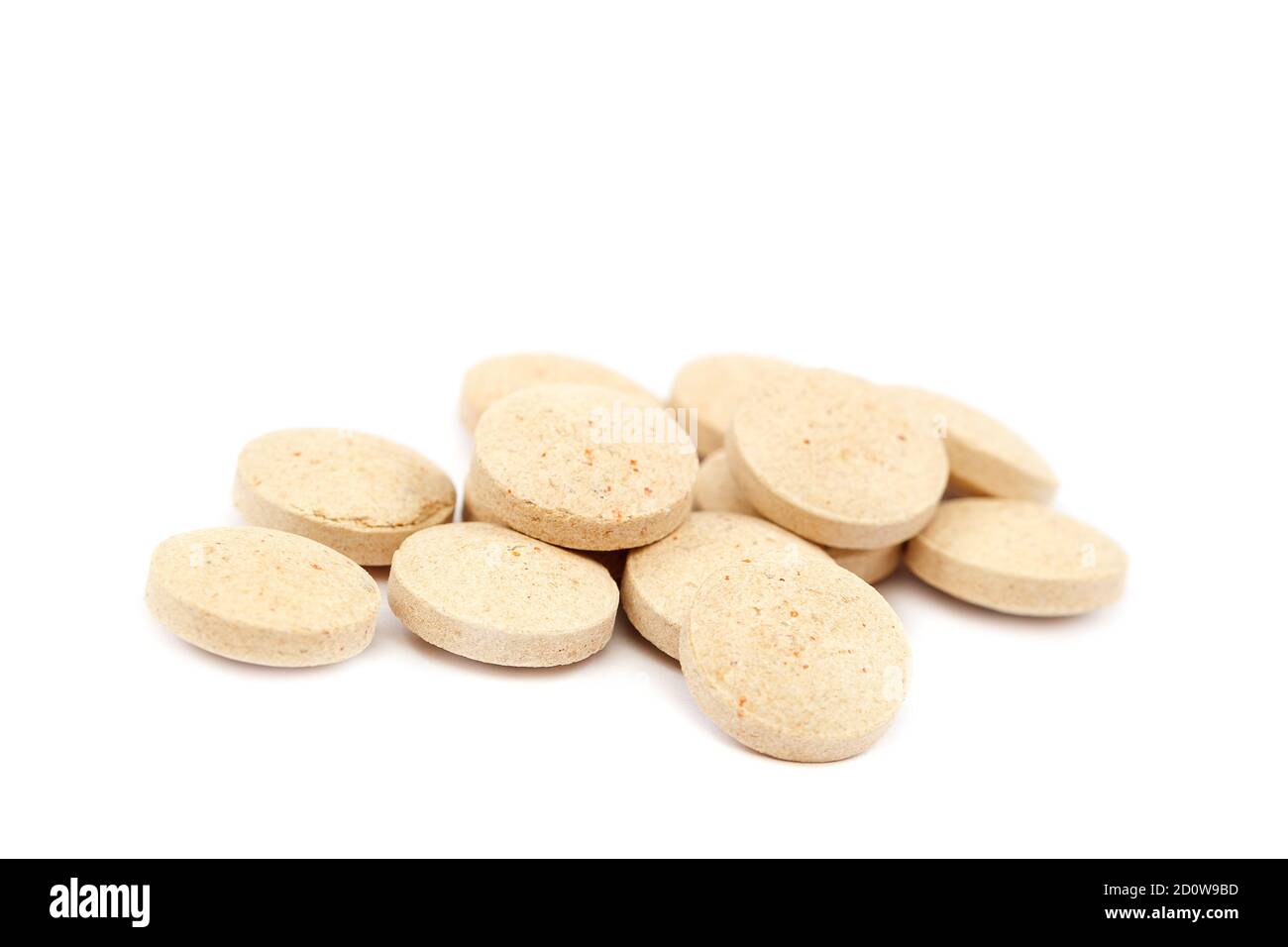 Pills food additives isolated on white background Stock Photo - Alamy