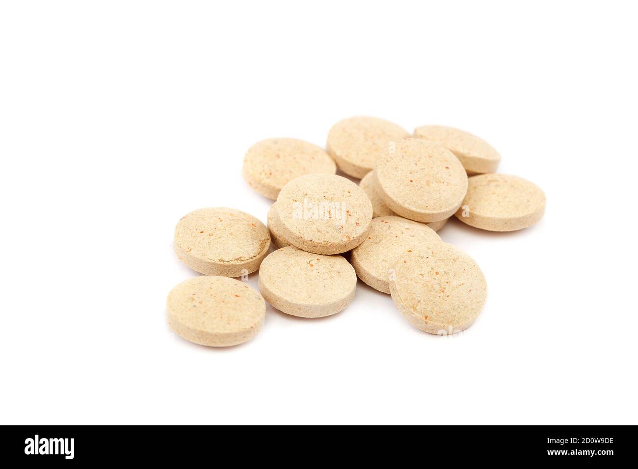 Pills food additives isolated on white background Stock Photo - Alamy