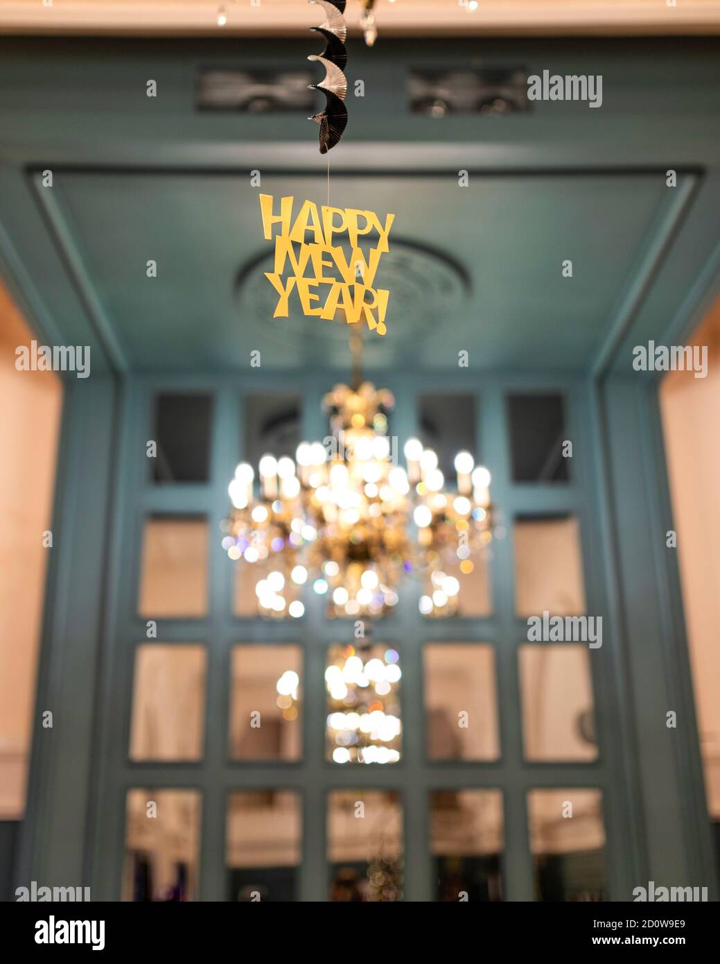 Happy New Year sticker in the restaurant interior Stock Photo - Alamy