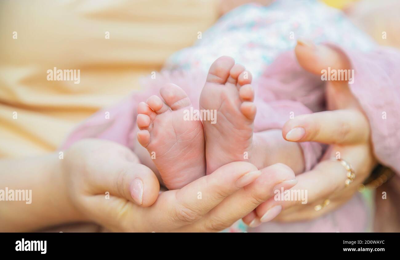 Baby in arms and soft focus hi-res stock photography and images - Alamy