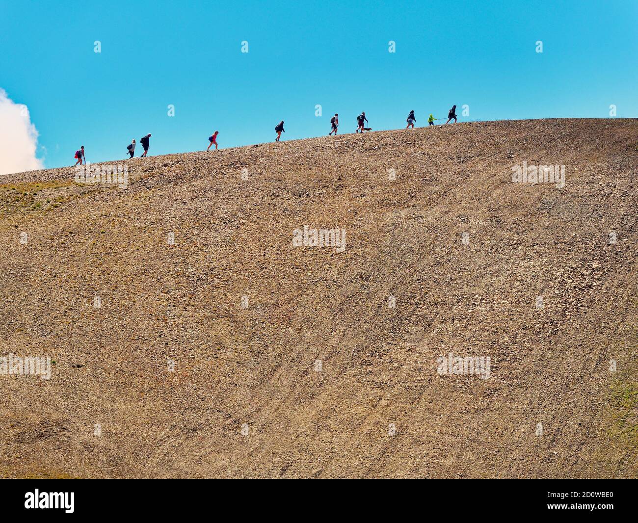 Group of people walking uphill hi-res stock photography and images - Alamy