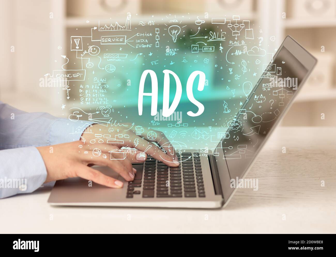 hand working on new modern computer with ADS abbreviation, modern ...