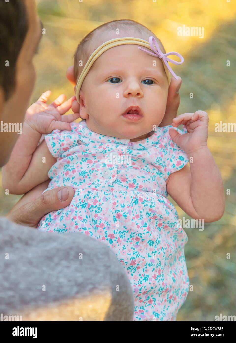 Father with his newborn daughter in his arms. Selective focus. daughter Stock Photo - Alamy