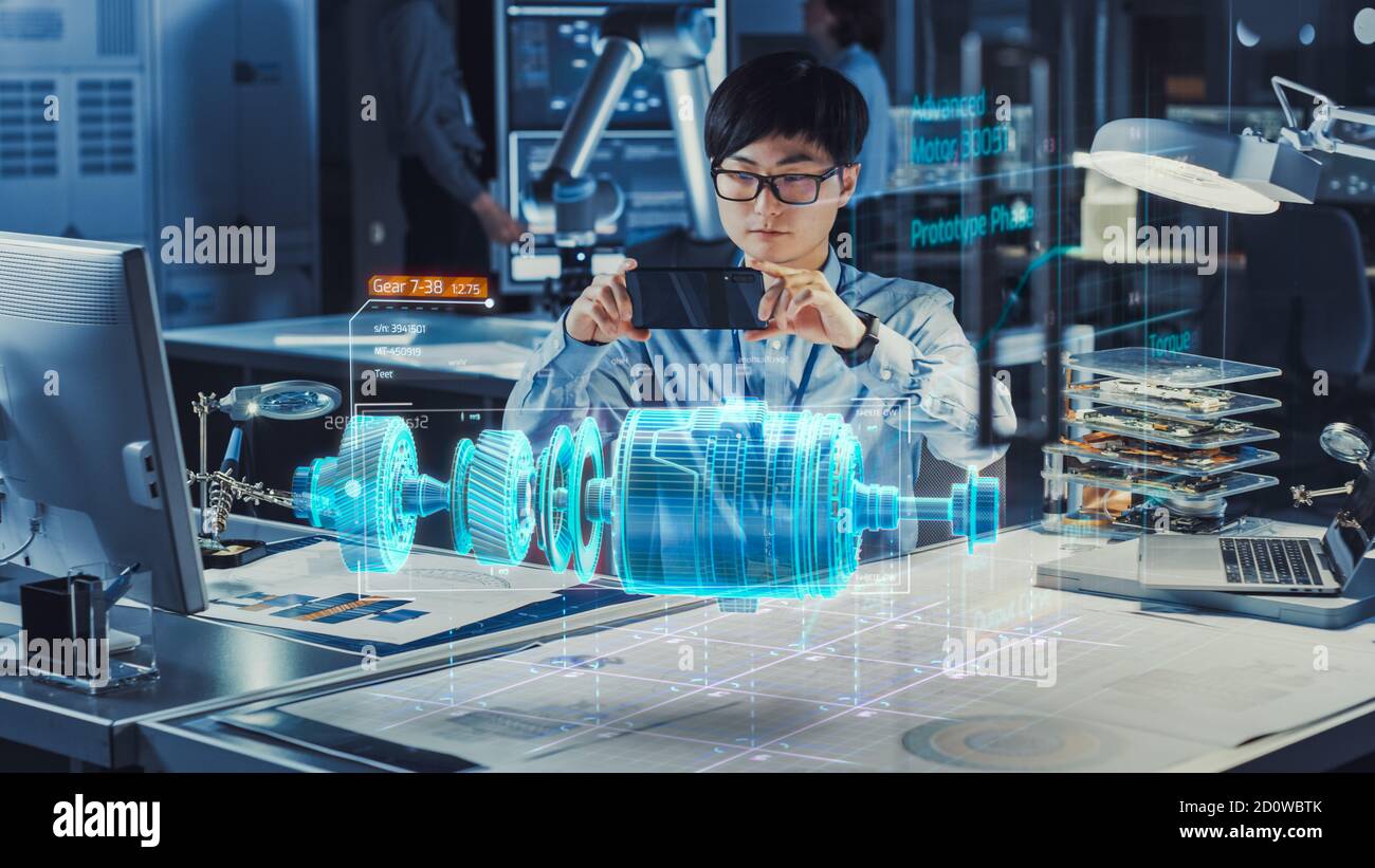 Industrial Engineer Works with Smartphone Using Augmented Reality ...