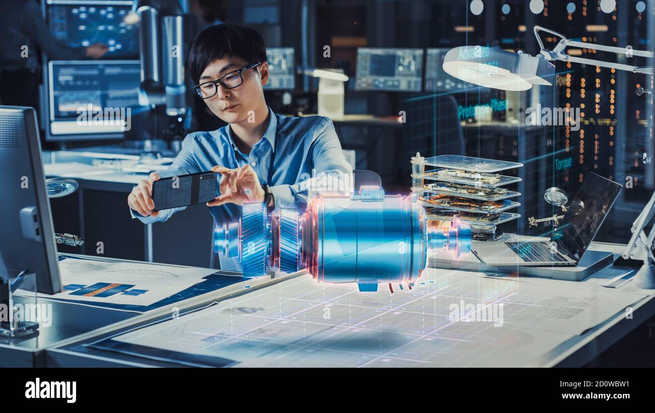 Industrial Engineer Works with Smartphone Using Augmented Reality ...