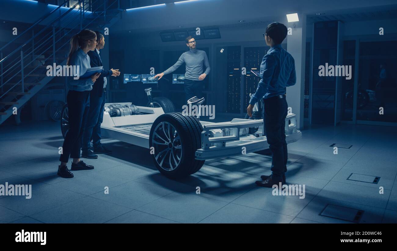 Automobile Engineers Working on Electric Car Platform Chassis, Using ...