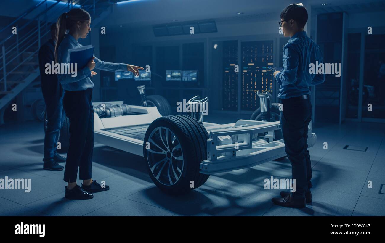 Automobile Engineers Working on Electric Car Platform Chassis, Using ...