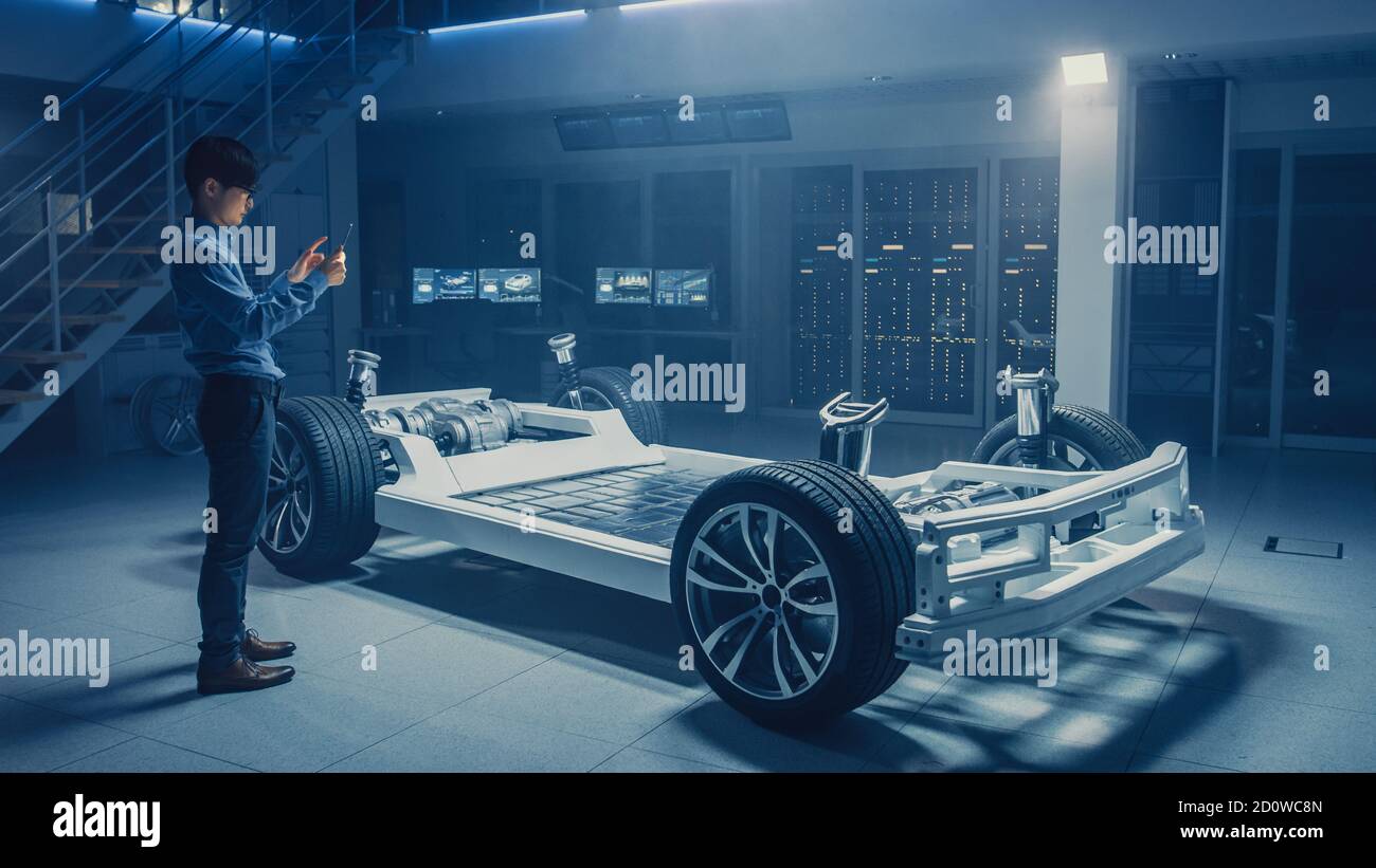 Automobile Engineer Working on Electric Car Chassis Platform, Using ...