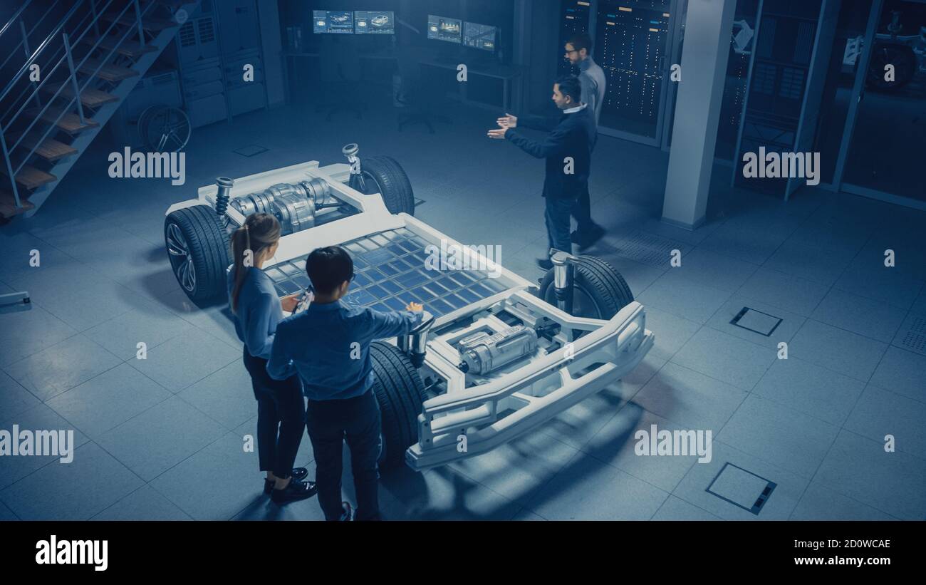 Team of Automotive Engineers Working on Electric Car Chassis Platform ...