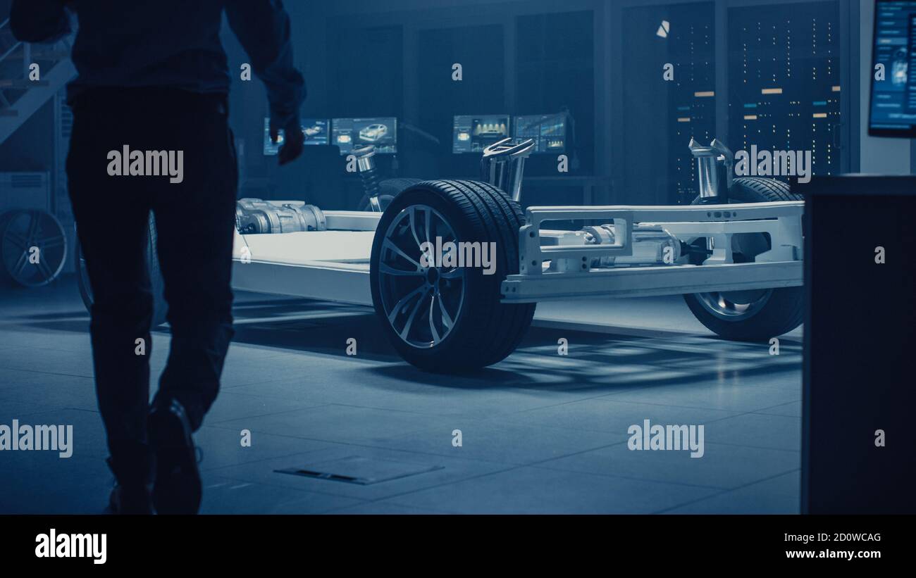 Automobile Engineer Enter Automotive Innovation Facility to Work on ...