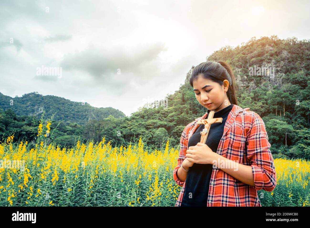 Young sad christian woman praying hi-res stock photography and images ...