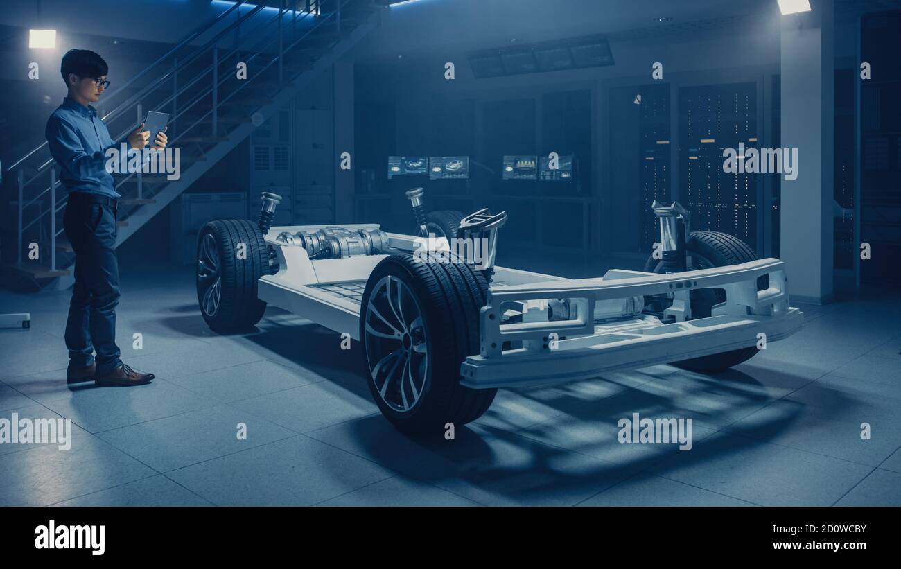 Automobile Engineer Working on Electric Car Chassis Platform, Using ...