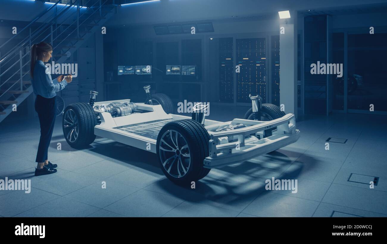 Automobile Engineer Working on Electric Car Chassis Platform, Using ...