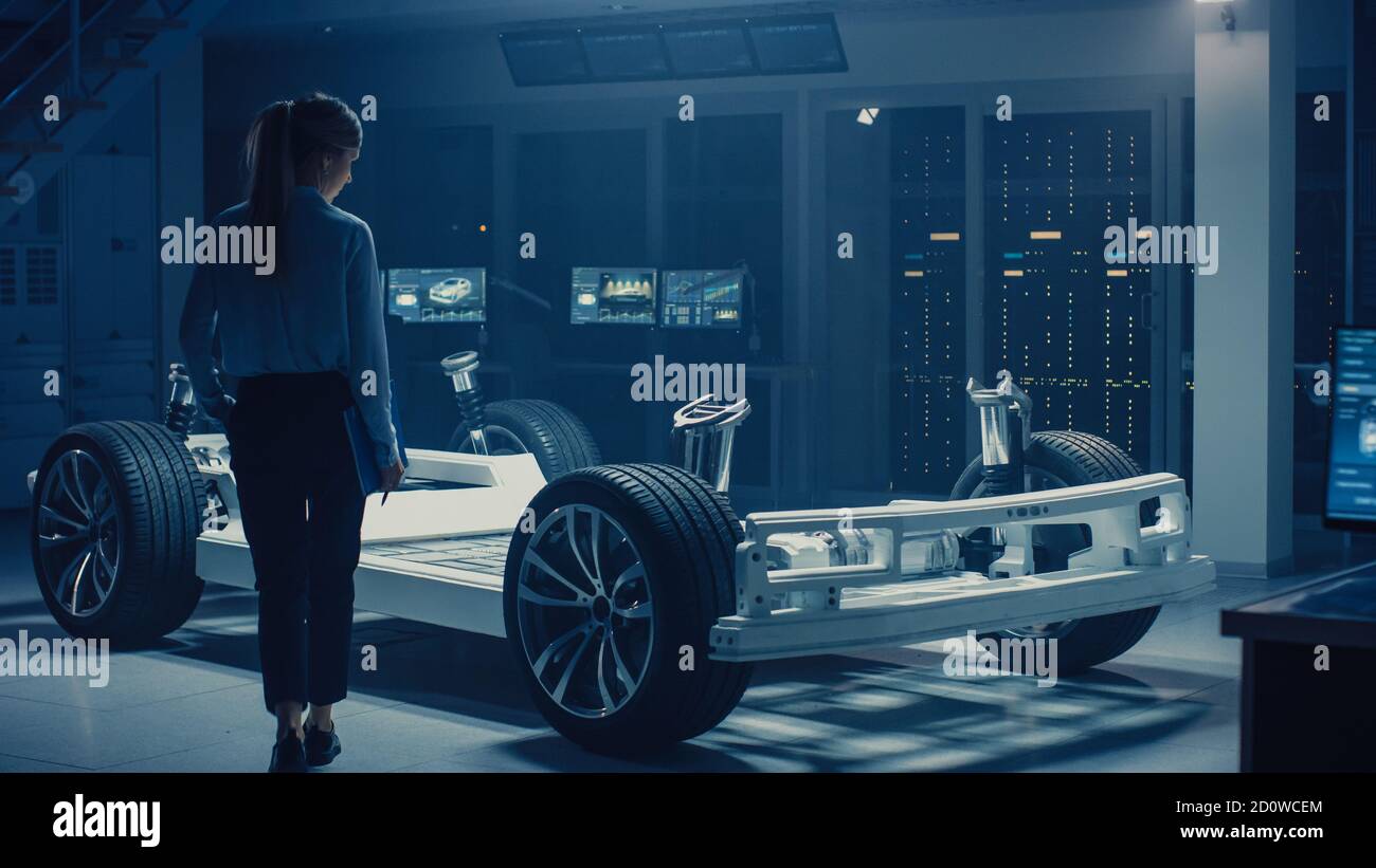 Automobile Female Engineer Working on Electric Car Chassis Prototype ...