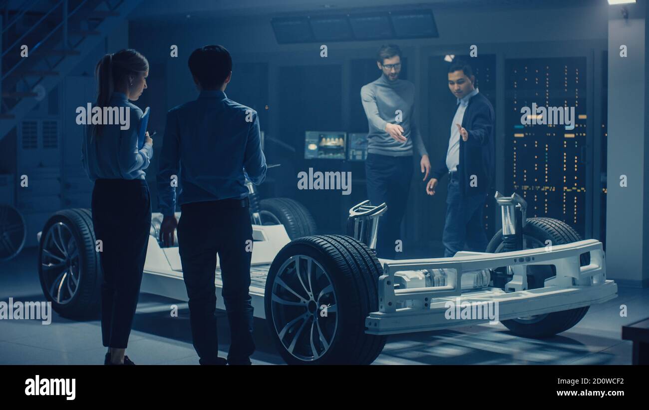 Team of Automotive Engineers Working on Electric Car Chassis Platform ...