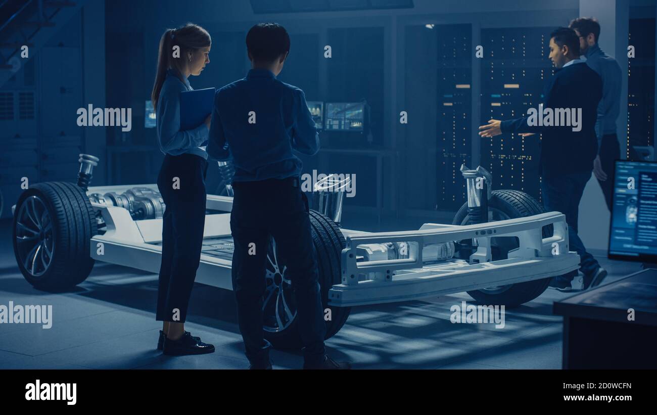 Team of Automotive Engineers Working on Electric Car Chassis Platform ...