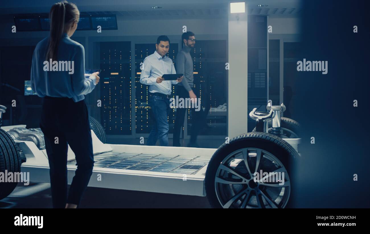 Team of Automotive Engineers Working on Electric Car Chassis Platform ...