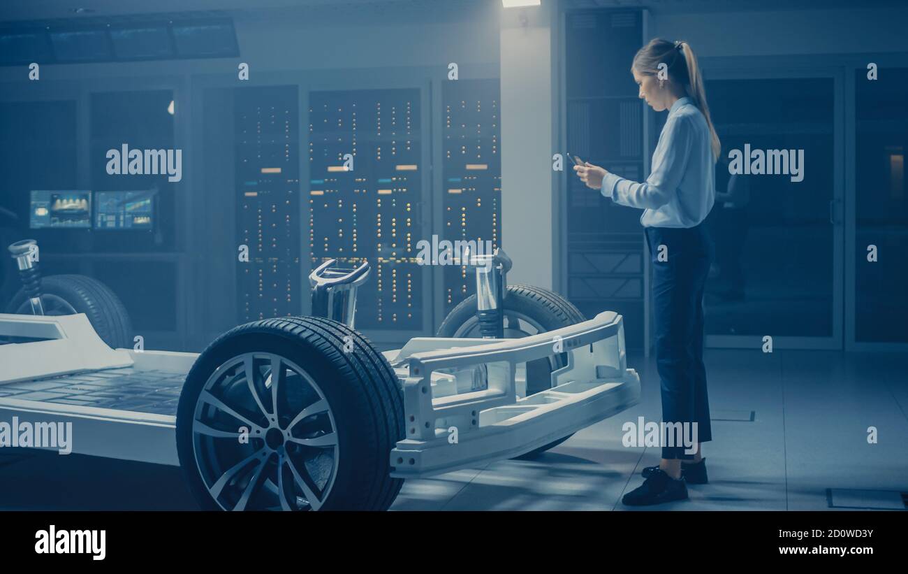 Automobile Engineer Working on Electric Car Chassis Platform, Using ...