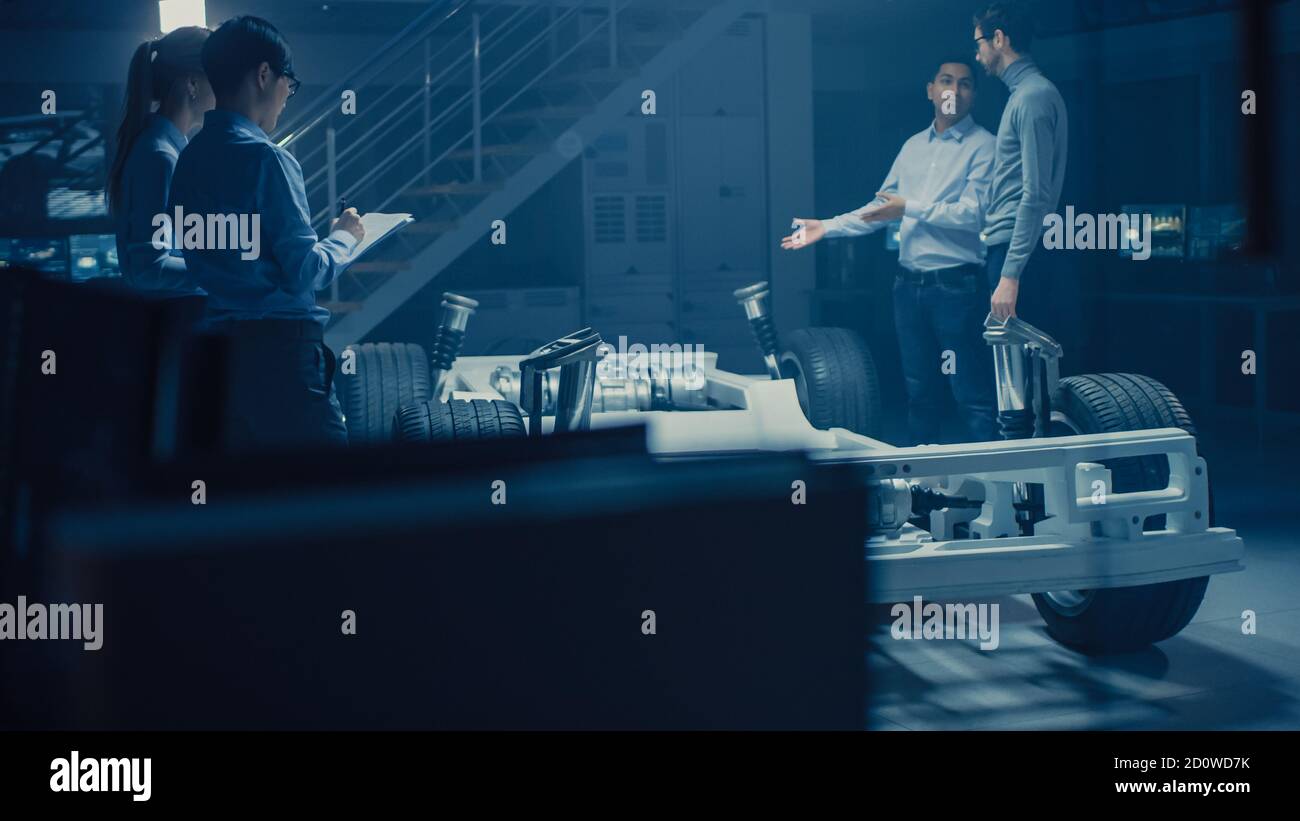 Automobile Engineers Working on Electric Car Chassis Platform, Using ...