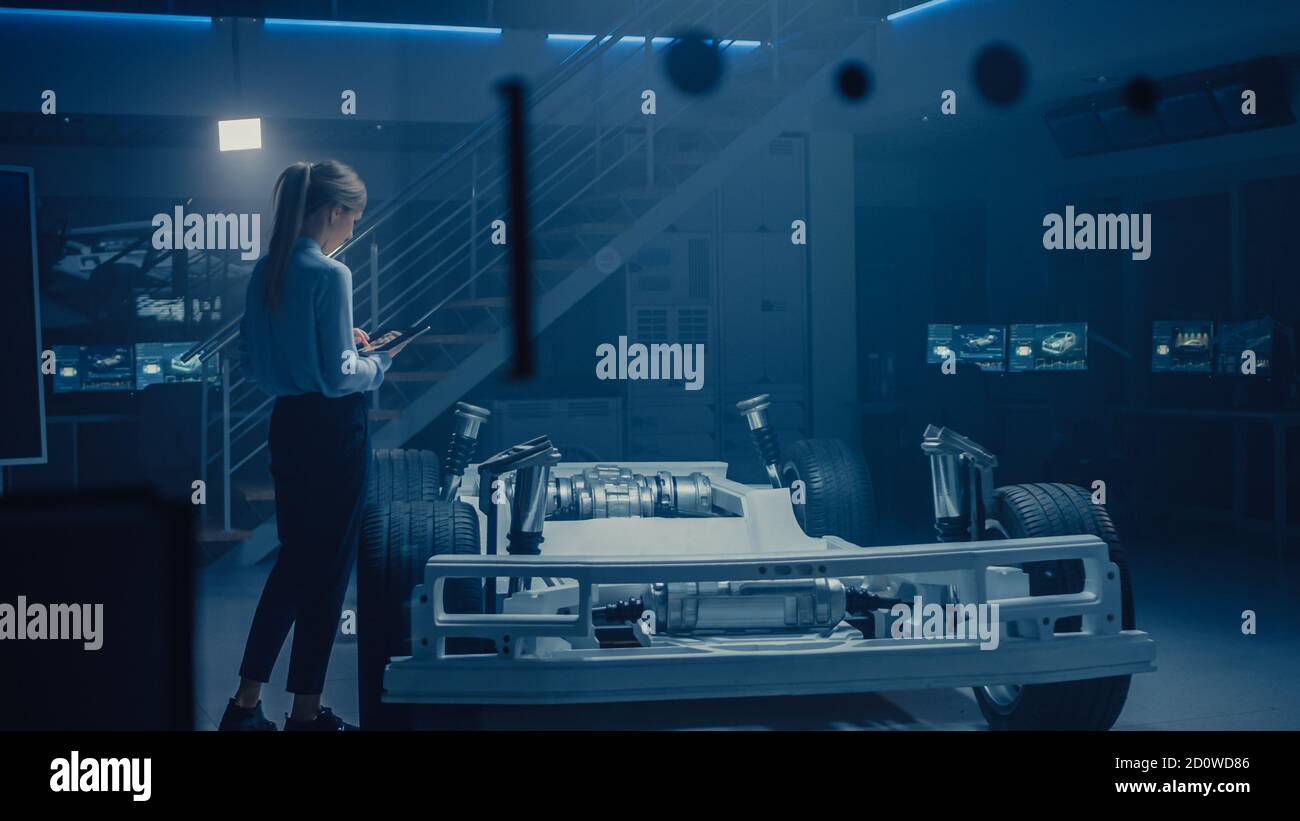 Automobile Engineer Working on Electric Car Chassis Platform, Using ...