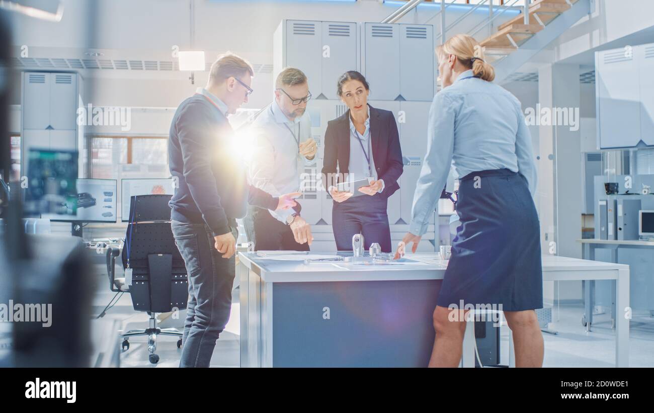 Gathered around table hi-res stock photography and images - Alamy
