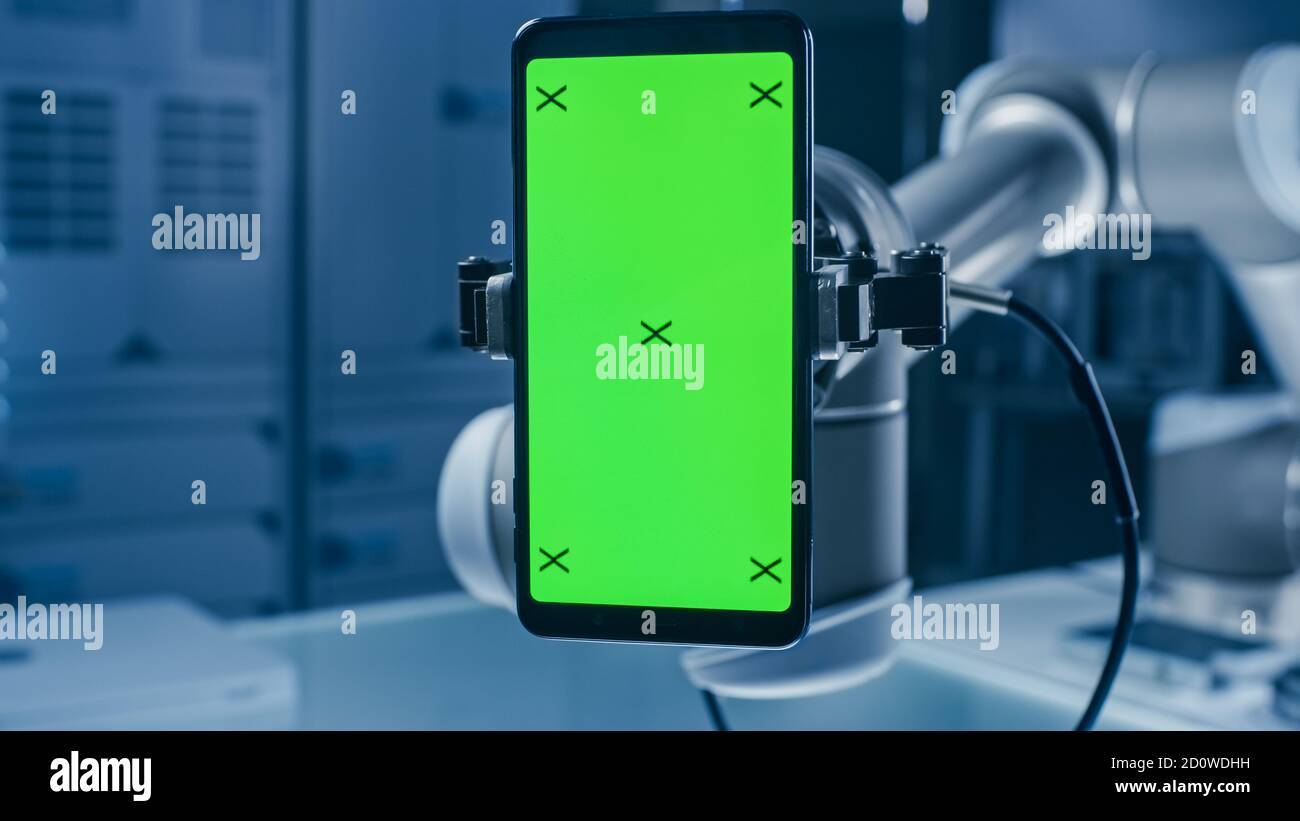 Real Robot Arm Holding Green Mock-Up Screen Smartphone Device ...