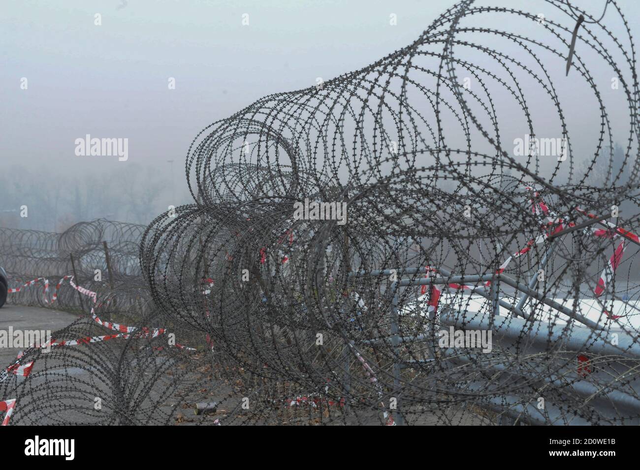 barbed wire fence at the border, obstacle when crossing the border ...