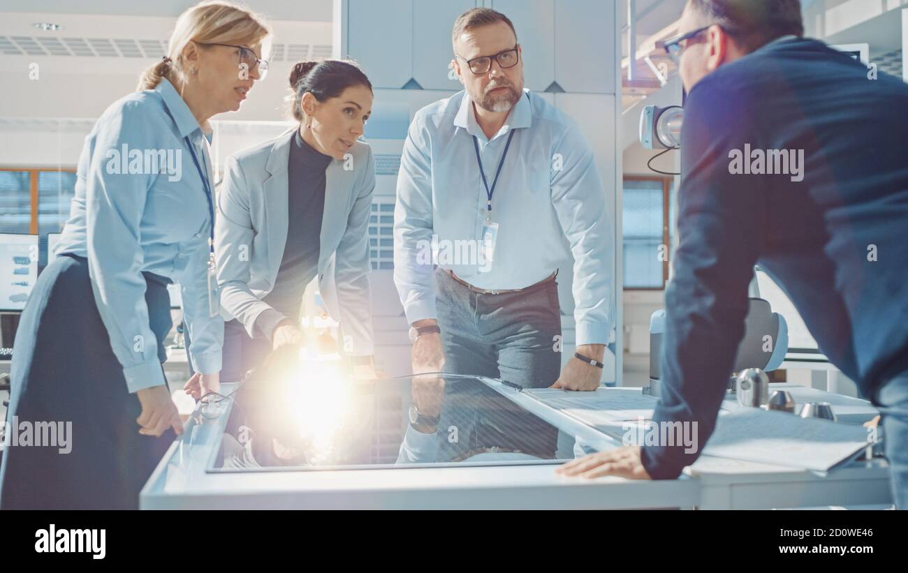 Team Meeting of Renewable Energy Engineers Working on an Innovative ...