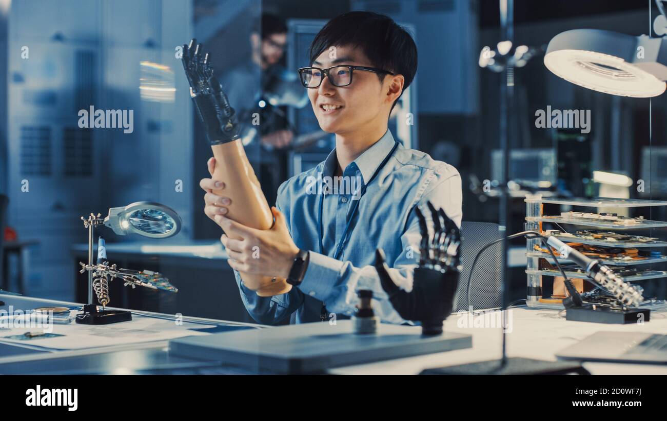 Futuristic Prosthetic Robot Arm Being Tested by a Professional Japanese ...