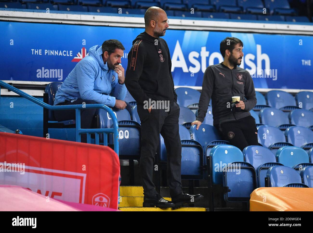Manchester City goalkeeper Scott Carson (left) and manager Pep ...