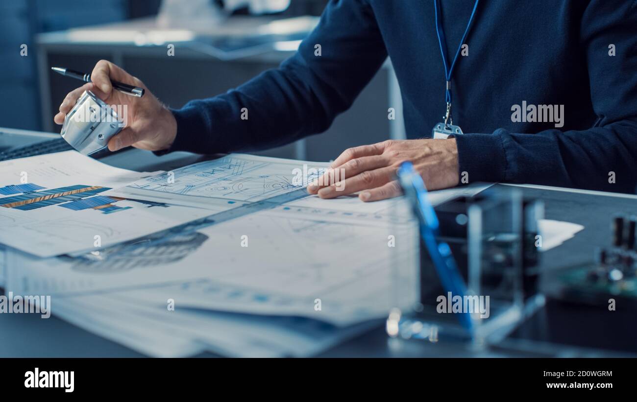 Heavy Industry Engineer Draws Engine Concept Blueprint. Engineering ...