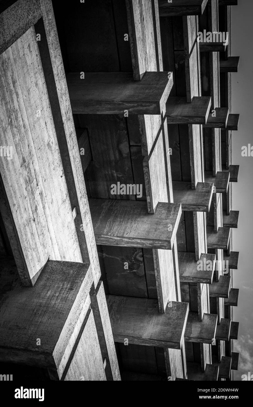 Vertical grayscale shot of a stone building structure Stock Photo - Alamy