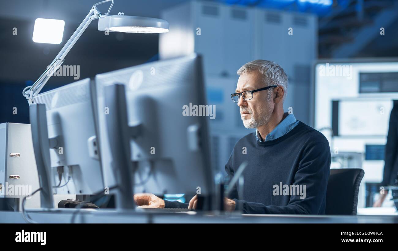 Shot of Industrial Engineer Working in Research Laboratory Development ...